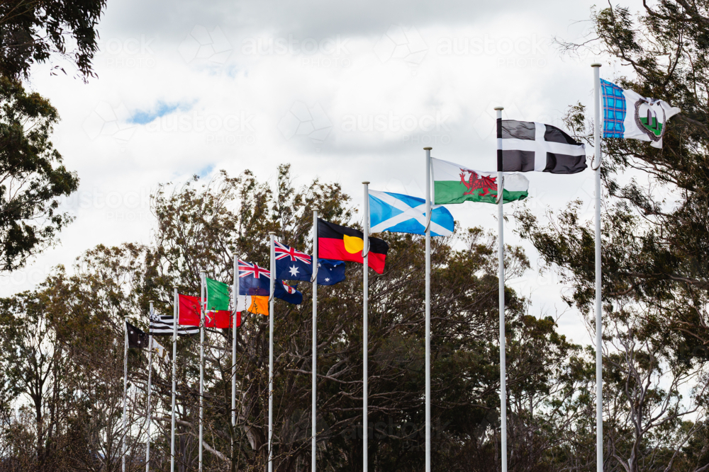 Image of Flags flying at Australian standing stones in Centennial ...