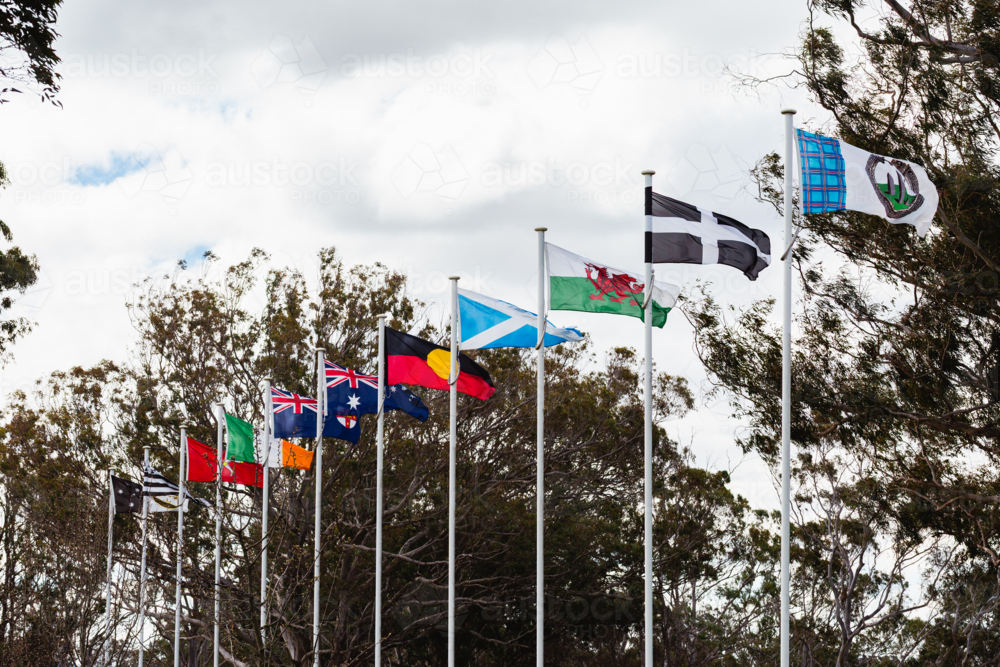 Image of Flags flying at Australian standing stones in Centennial ...
