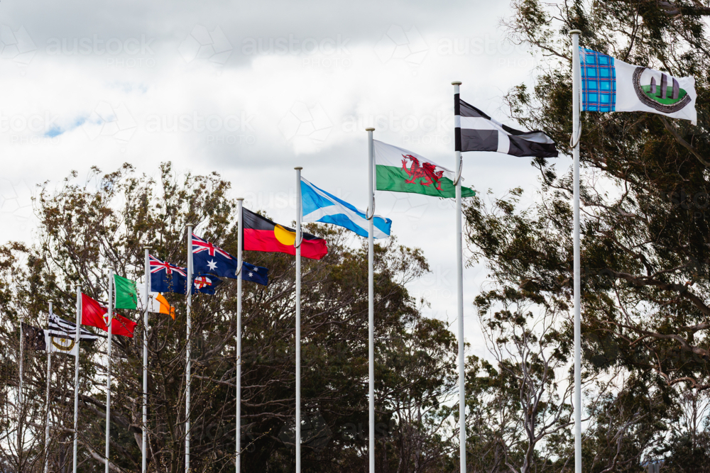 Image of Flags flying at Australian standing stones in Centennial ...