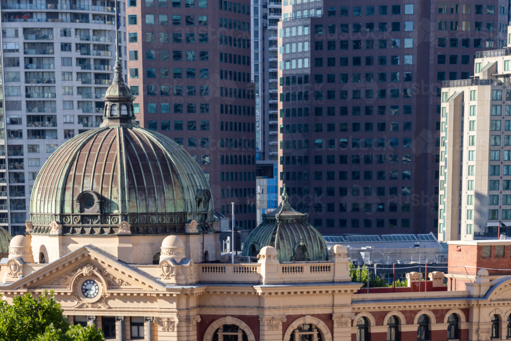 Image of Flinders street station foreground and high rise buildings in ...