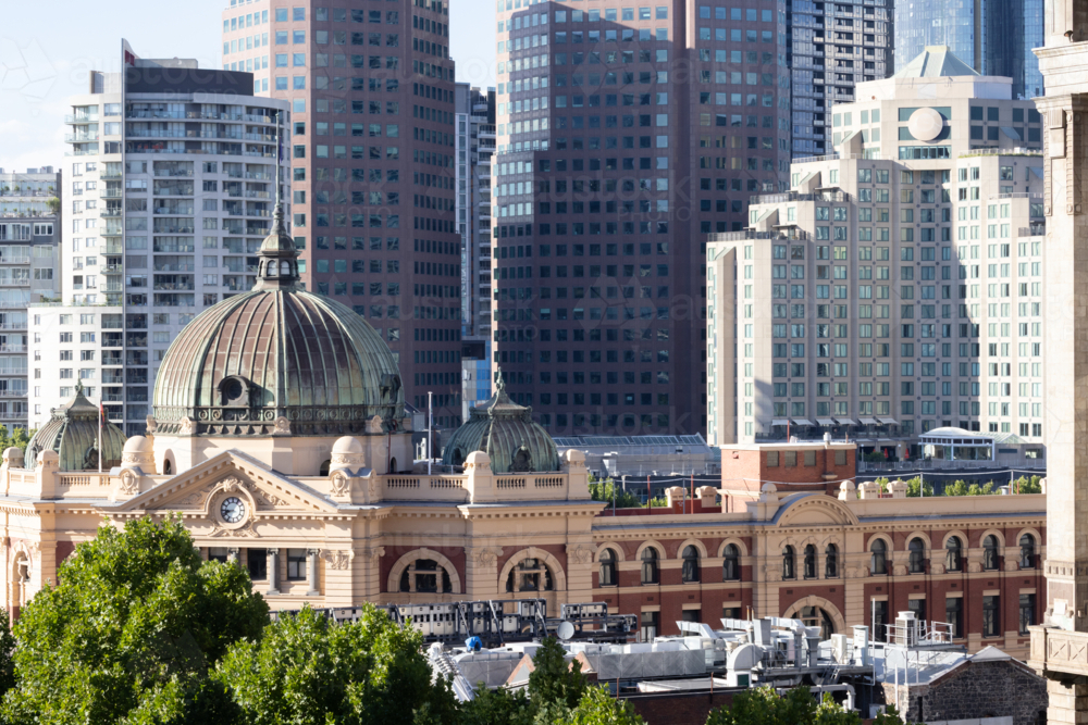 Image of Flinders street station foreground and high rise buildings in ...