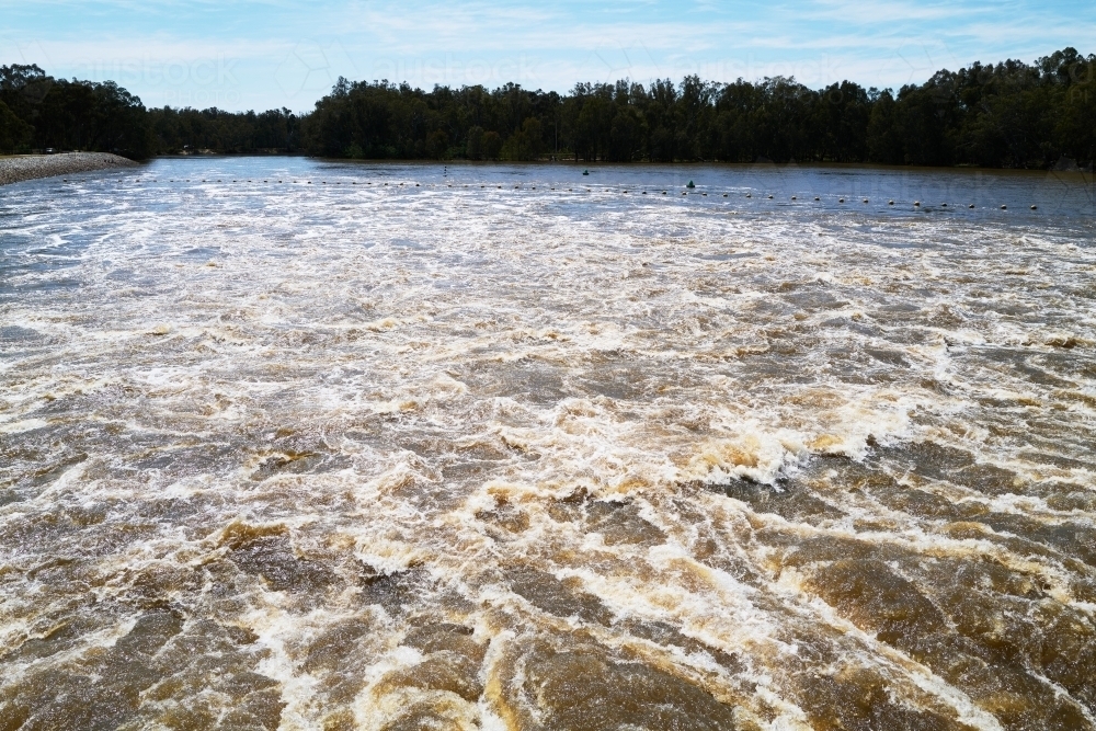 Image of Flood waters rising on river - Austockphoto