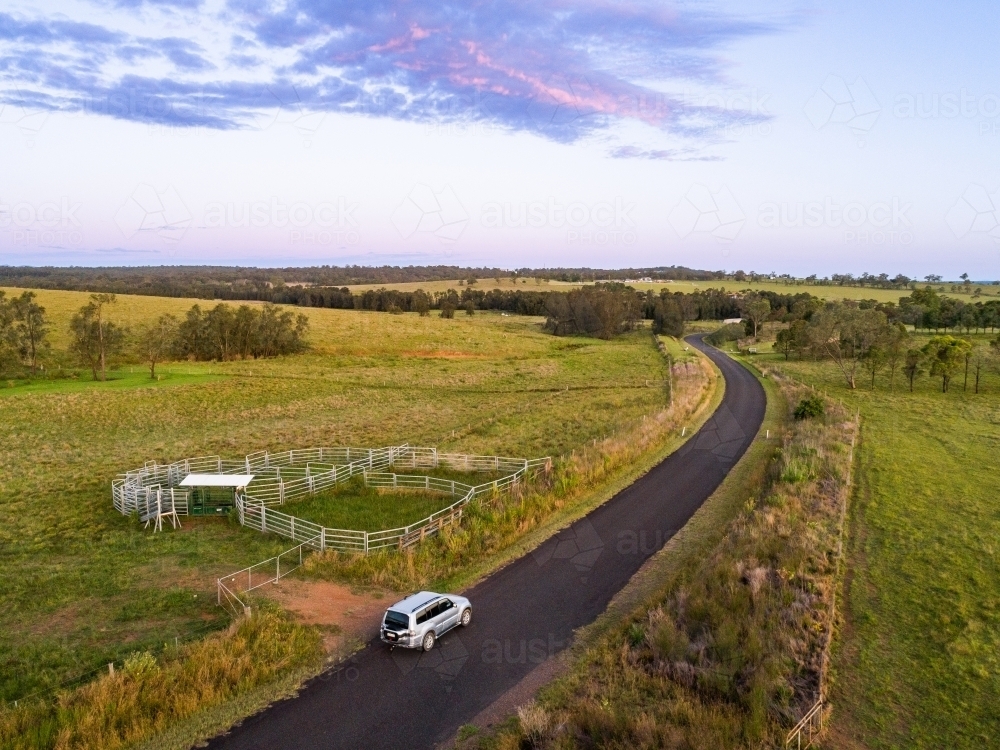 Image of four wheel drive car on narrow country road on road trip ...