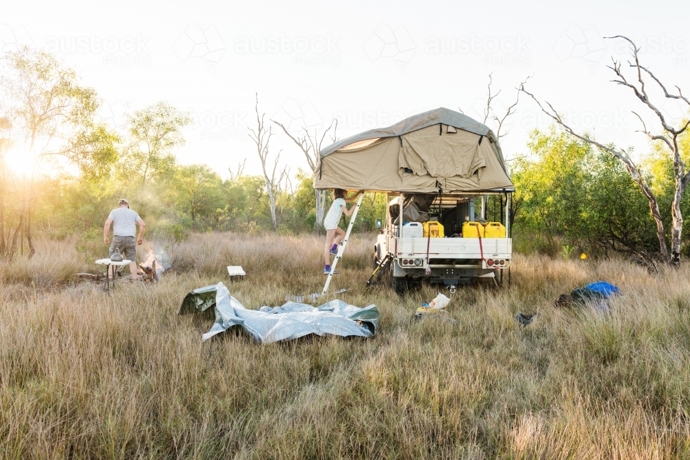 Image of Four wheel drive with roof top tent set up for camping in the ...