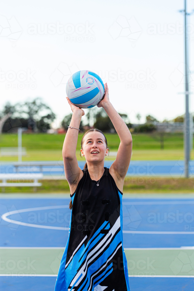 Image of Fourteen year old aboriginal sports player about to throw ...