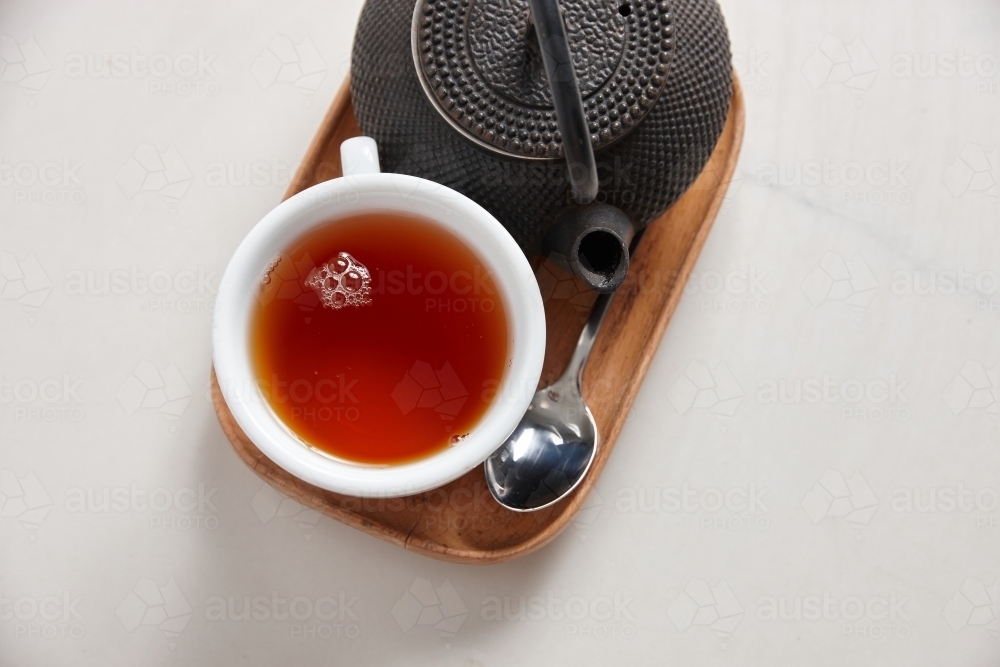 Image of Fresh cup of tea served on table - Austockphoto