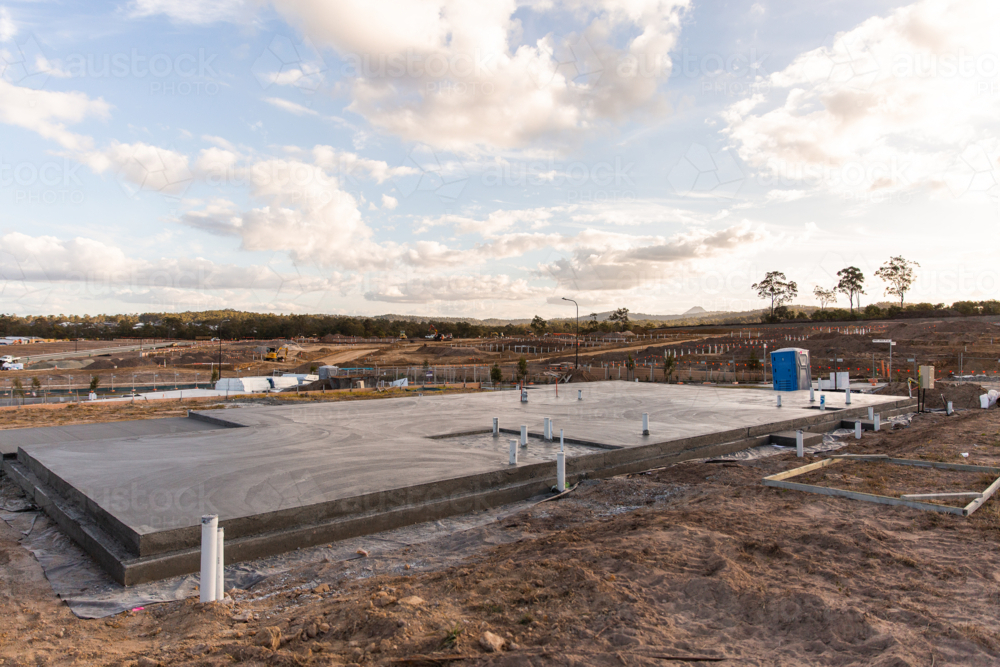 Image of freshly poured slab of a house getting built on a new housing ...