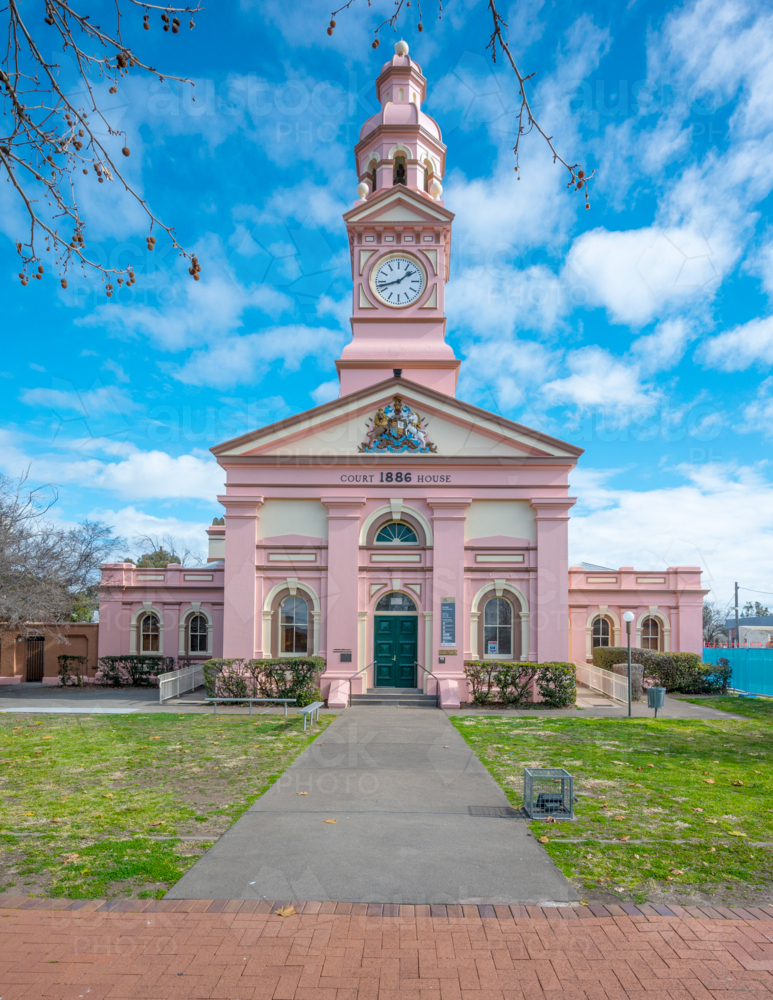 Image of Front elevation of the pink historic inverell court house, In ...
