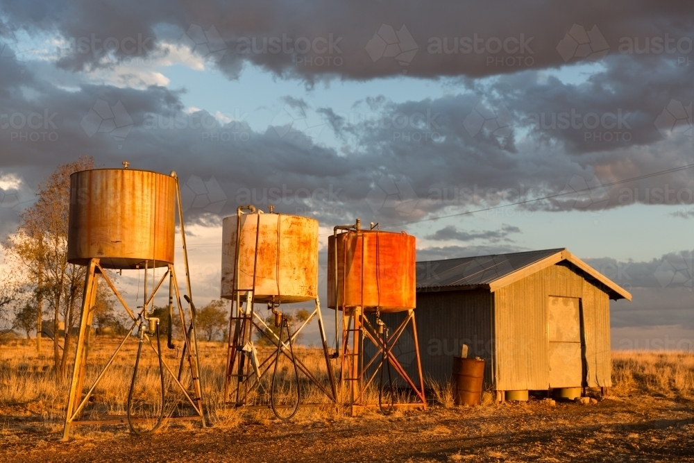 Image of Fuel Bowsers and a shed on a Agricultural Farm - Austockphoto