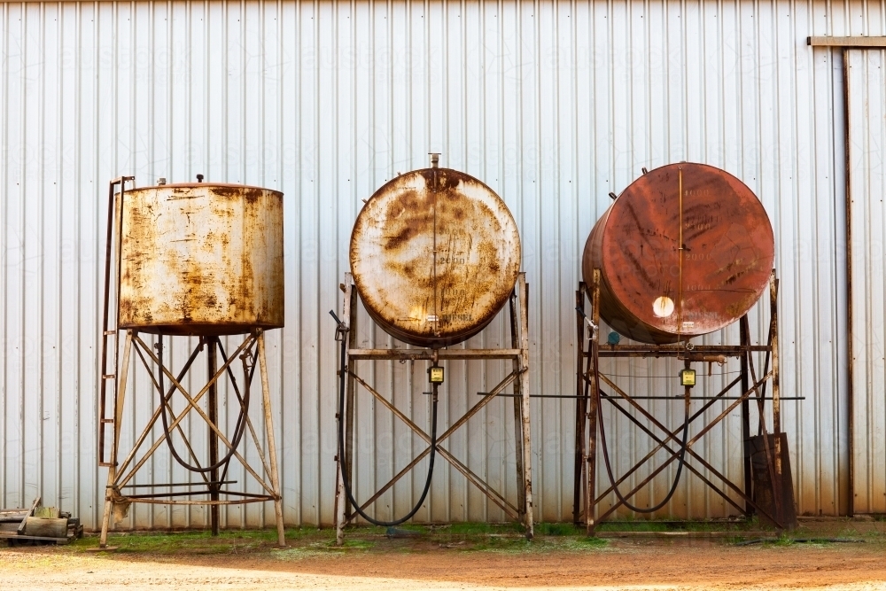 Image of Fuel tanks on a farm - Austockphoto