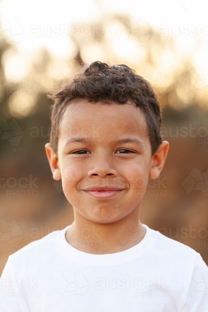 Image of Full face portrait of a first nations Australian boy outside ...