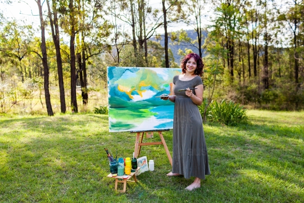 Image of Full length portrait of teenage artist beginning an acrylic ...