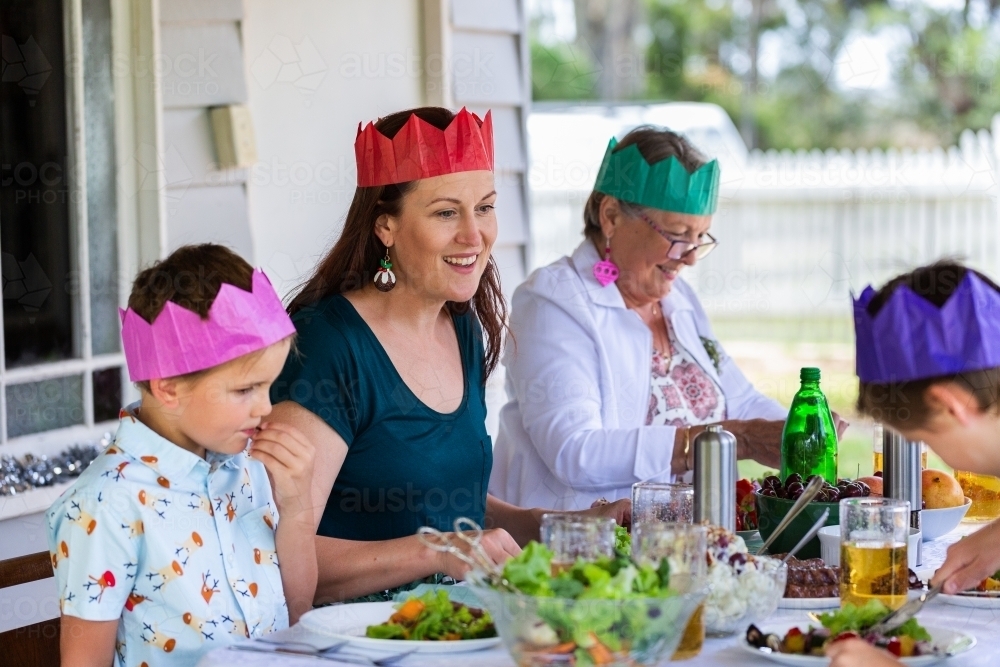 Image of Generations of Australian family together at Christmas eating ...