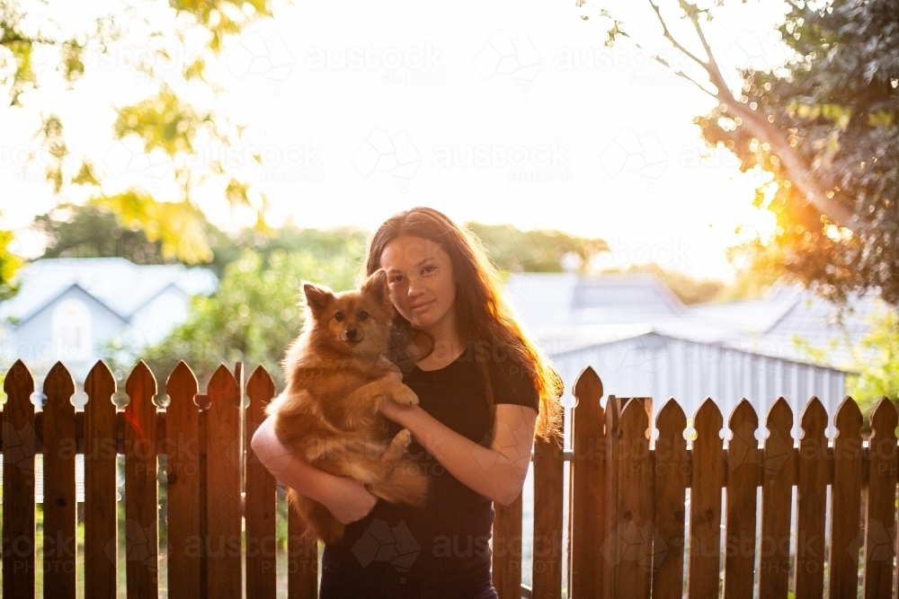 Image of girl and her dog - Austockphoto