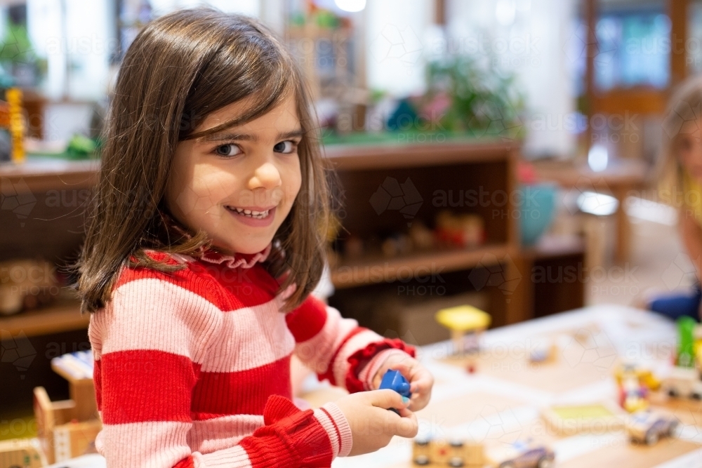 Image of Girl child learning at pre-school - Austockphoto