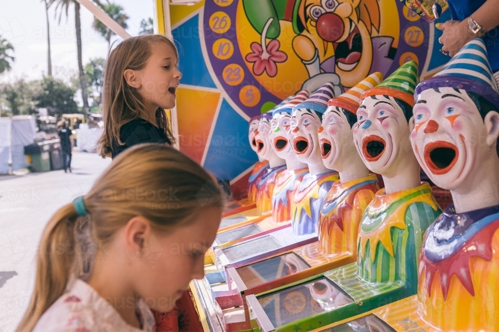 Image of girls having fun at Sideshow Alley, Royal Show (Ekka) - Austockphoto