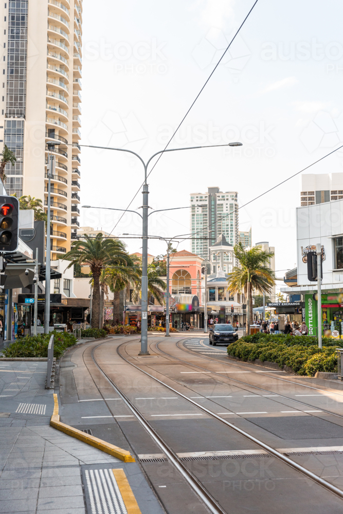 Image of Gold Coast looking along tram line to buildings, palm trees ...