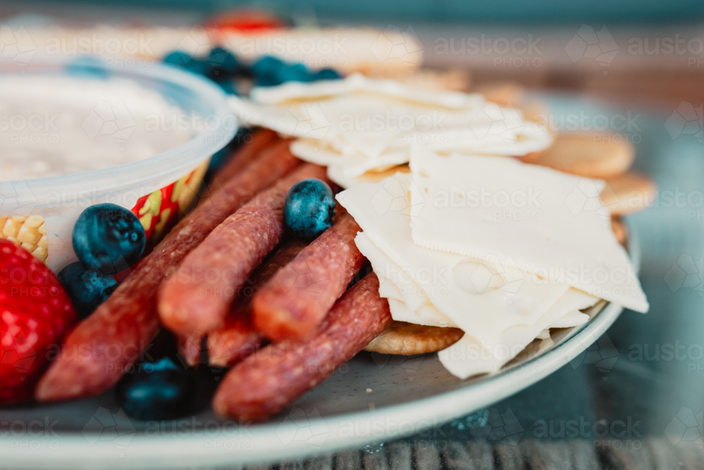 Image of Gourmet snack platter with cheese, salami, crackers ...