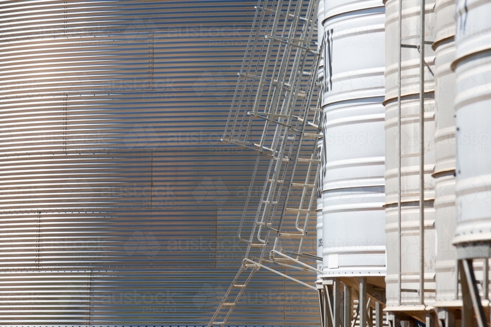 Image of Grain storage silos on a farm - Austockphoto