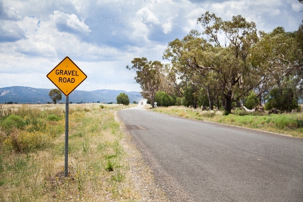 Image of Gravel road sign - Austockphoto