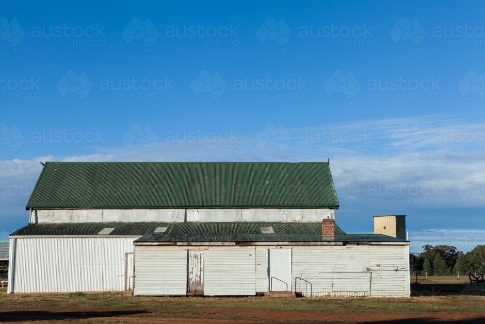 Image of Green and white shed in Trundle showground - Austockphoto