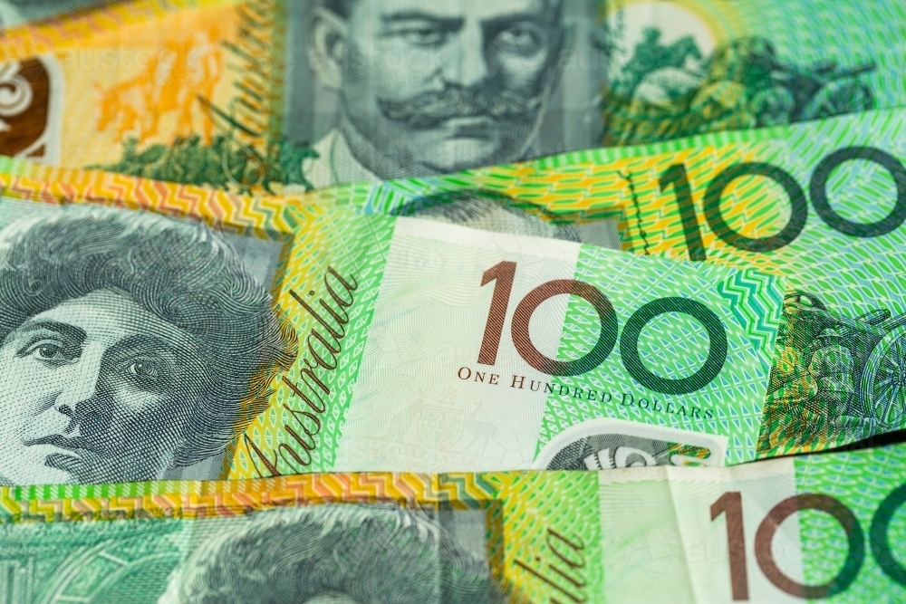 Image of Green australian one hundred dollar notes in cash - Austockphoto