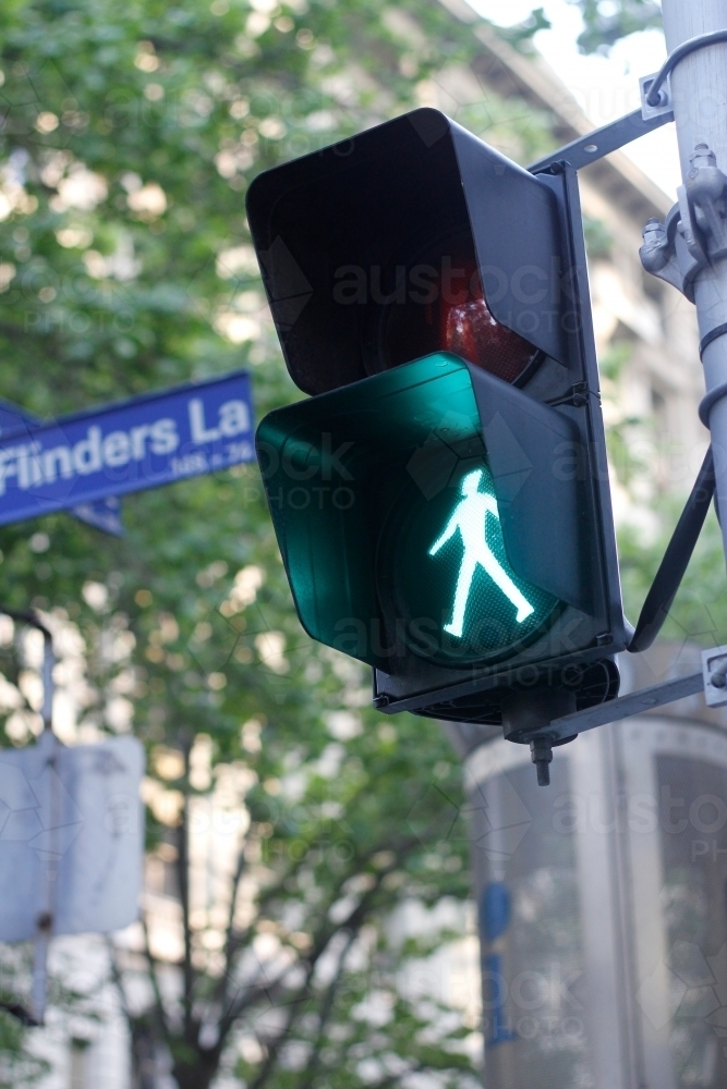 Image of Green man on pedestrian crossing light - Austockphoto