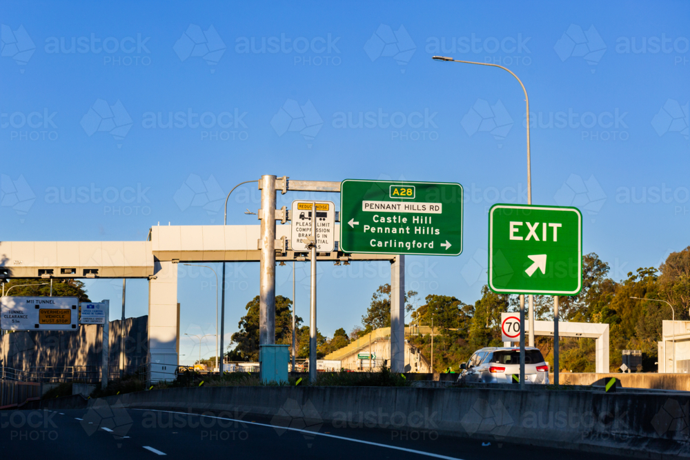Image of Green roadside signage exit sign and directions to Castle Hill ...