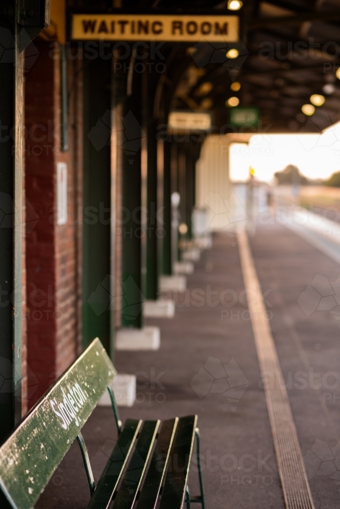 Image of Green seat saying Singleton on the platform at the train ...