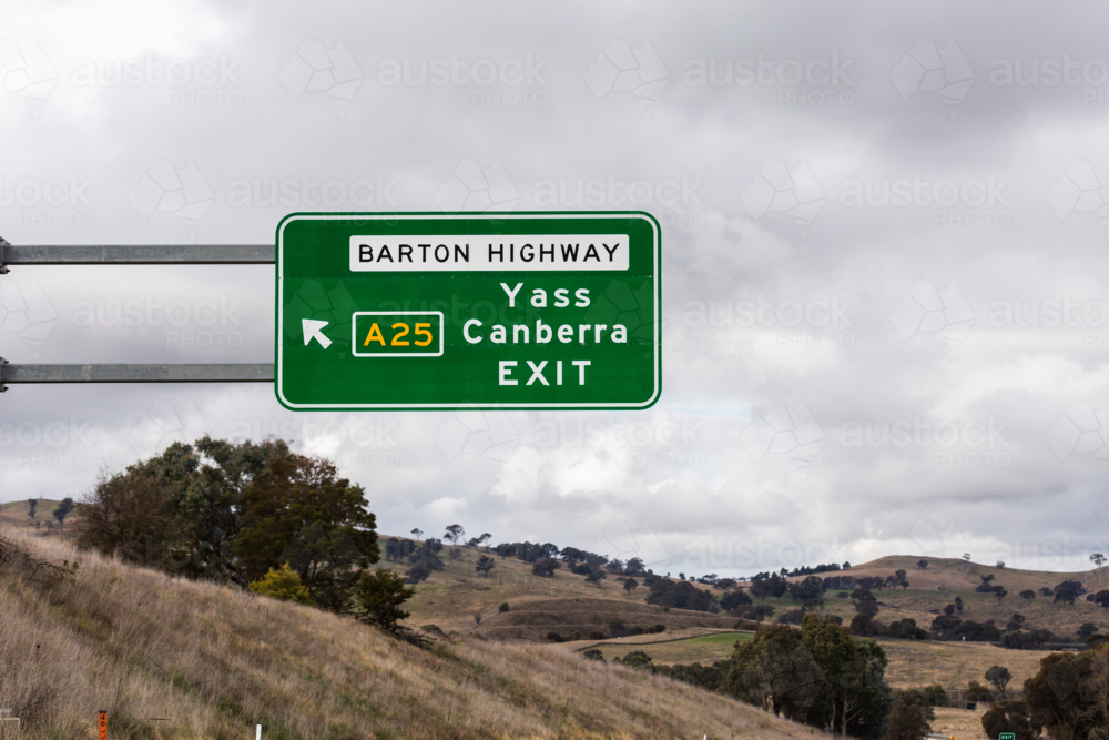 Image of Green sign above road to Barton Highway Yass Canberra EXIT A25 ...
