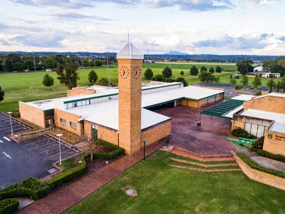 Image of Green with stairs up to council buildings and community hall ...