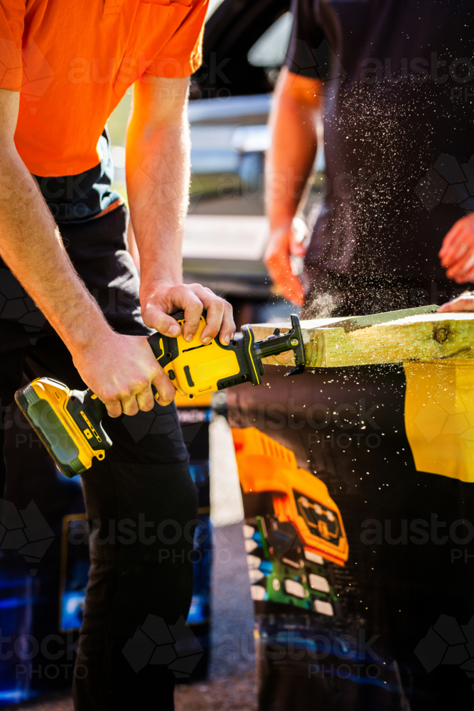 Image of hands on tool demonstration and lesson - trade apprentice ...