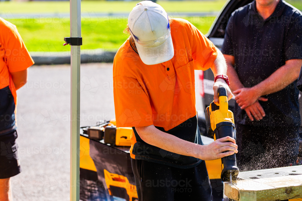 Image of hands on tool demonstration and lesson - trade apprentice ...