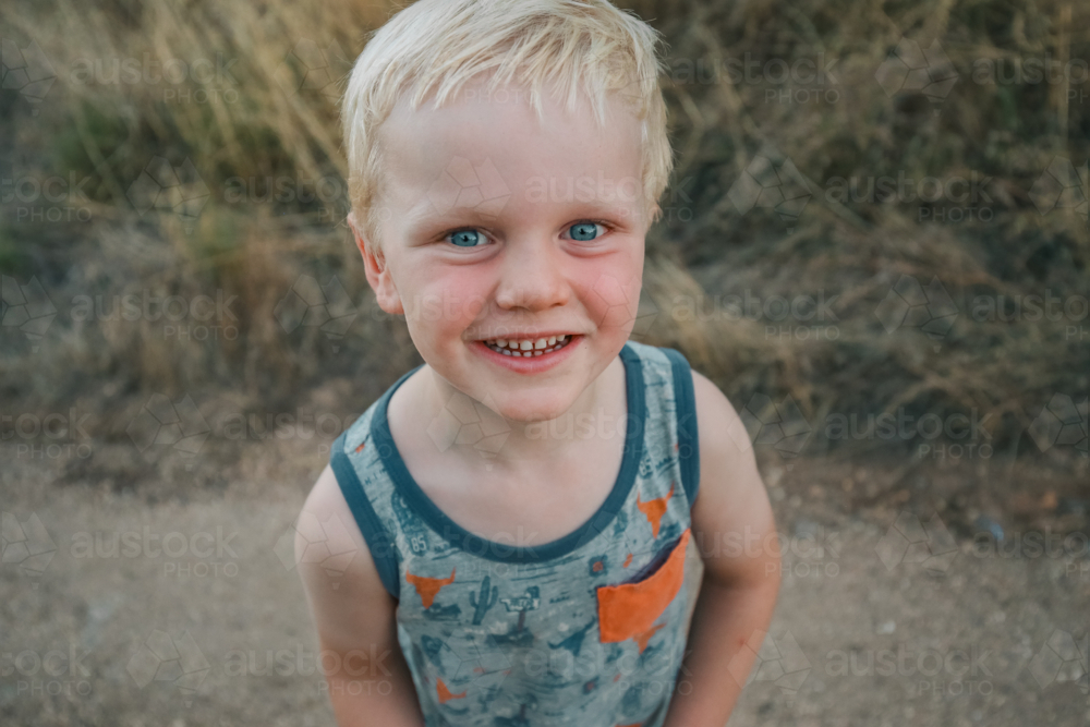 Image of Happy boy smiling on bushwalk along rural Australian country ...