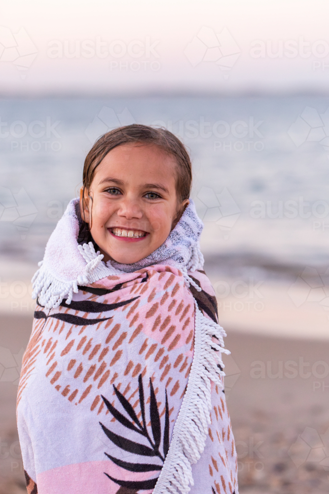 Image of Happy First Nations Australian girl wrapped in a warm towel ...