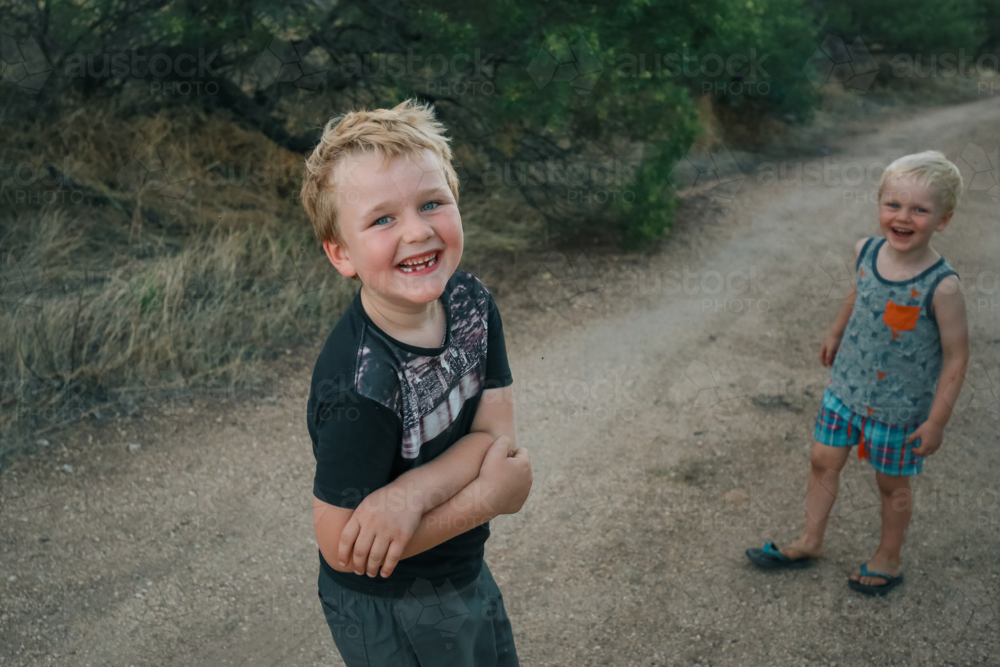 Image of Happy kids on bushwalk along rural Australian country road ...