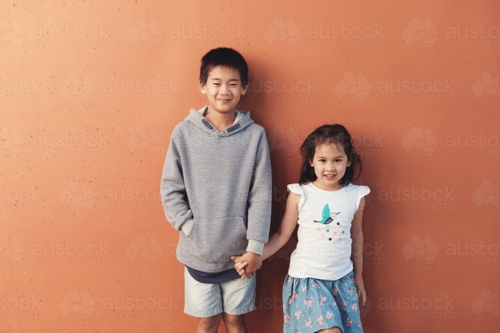 Image of Happy multicultural boy and girl - Austockphoto