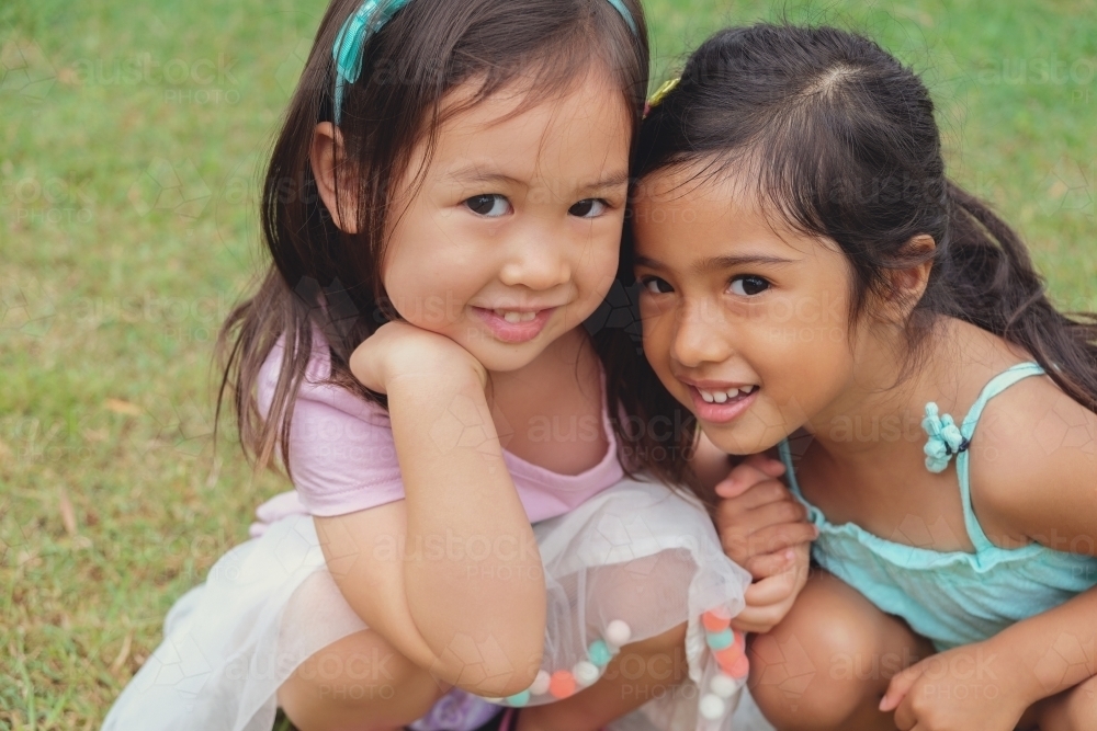 Image of Happy multicultural young girls - Austockphoto