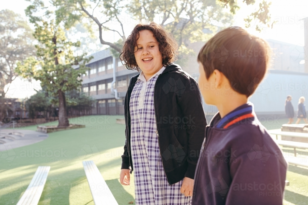Image of Happy primary school students - Austockphoto