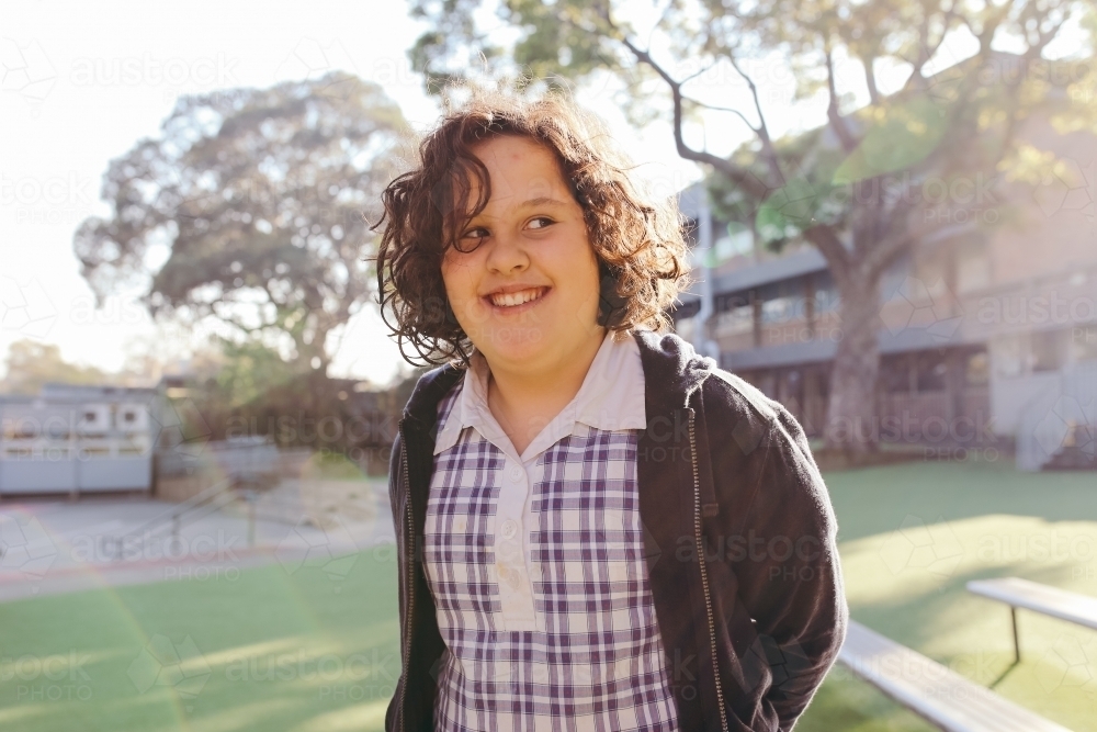 Image of Happy primary school student - Austockphoto