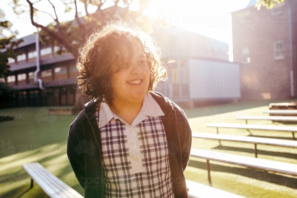 Image of Happy primary school student - Austockphoto