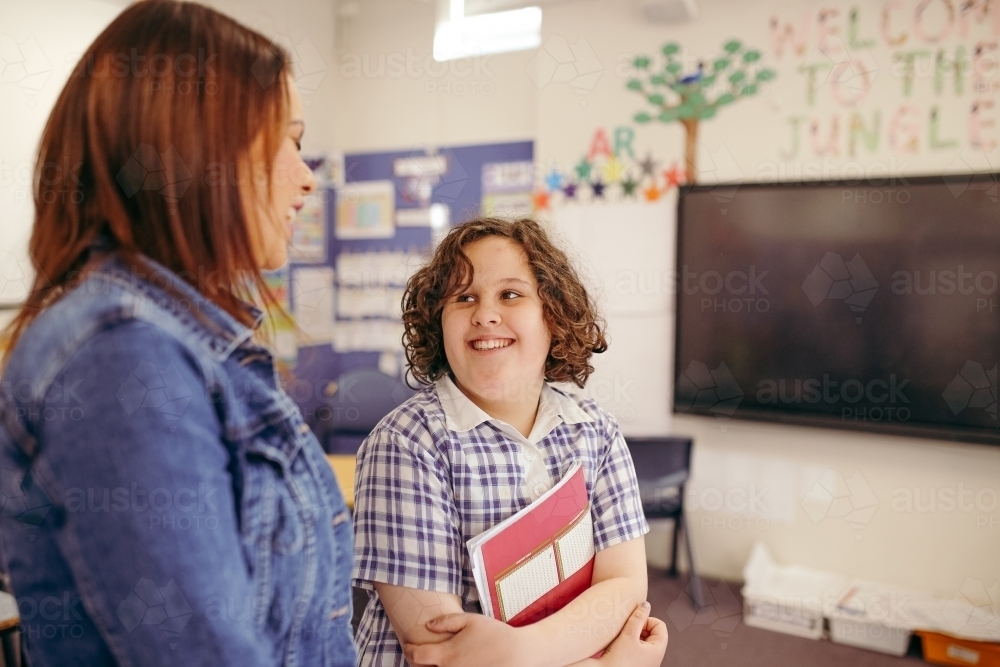 Image of Happy primary school student - Austockphoto