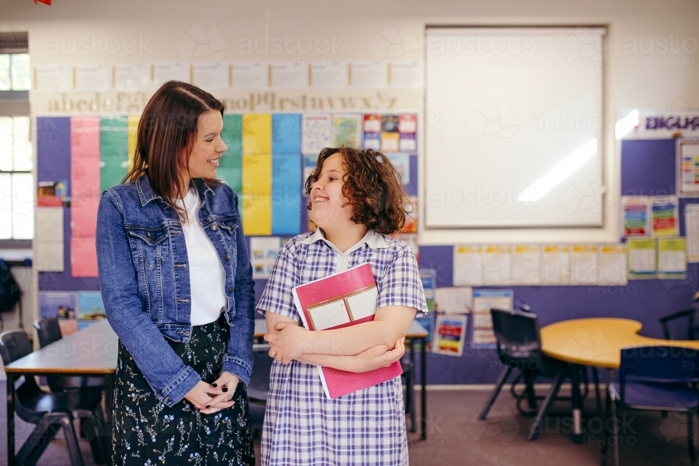 Image of Happy primary school student - Austockphoto
