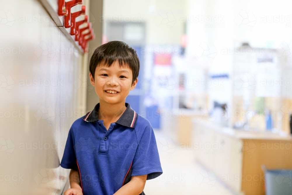 Image of Happy primary school student - Austockphoto