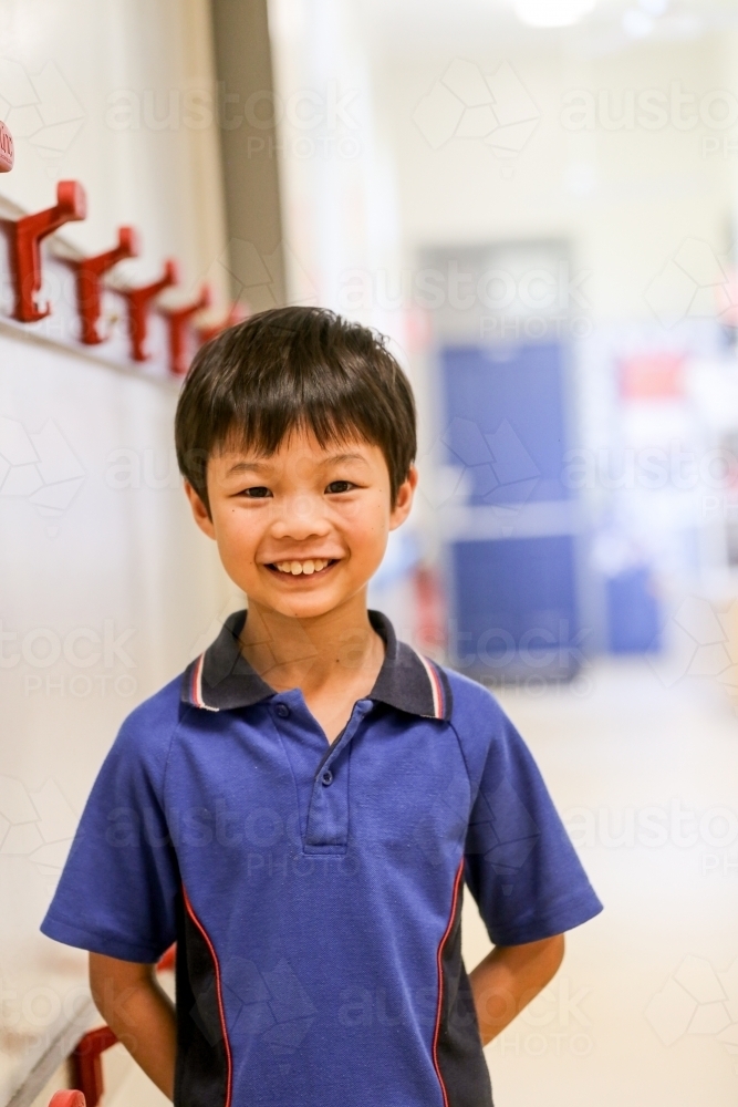Image of Happy primary school student - Austockphoto