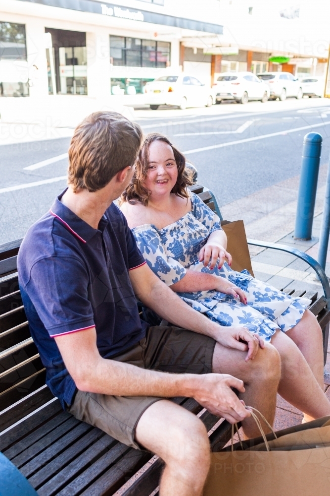 Image of Happy teenage girl with a disability using public transport ...