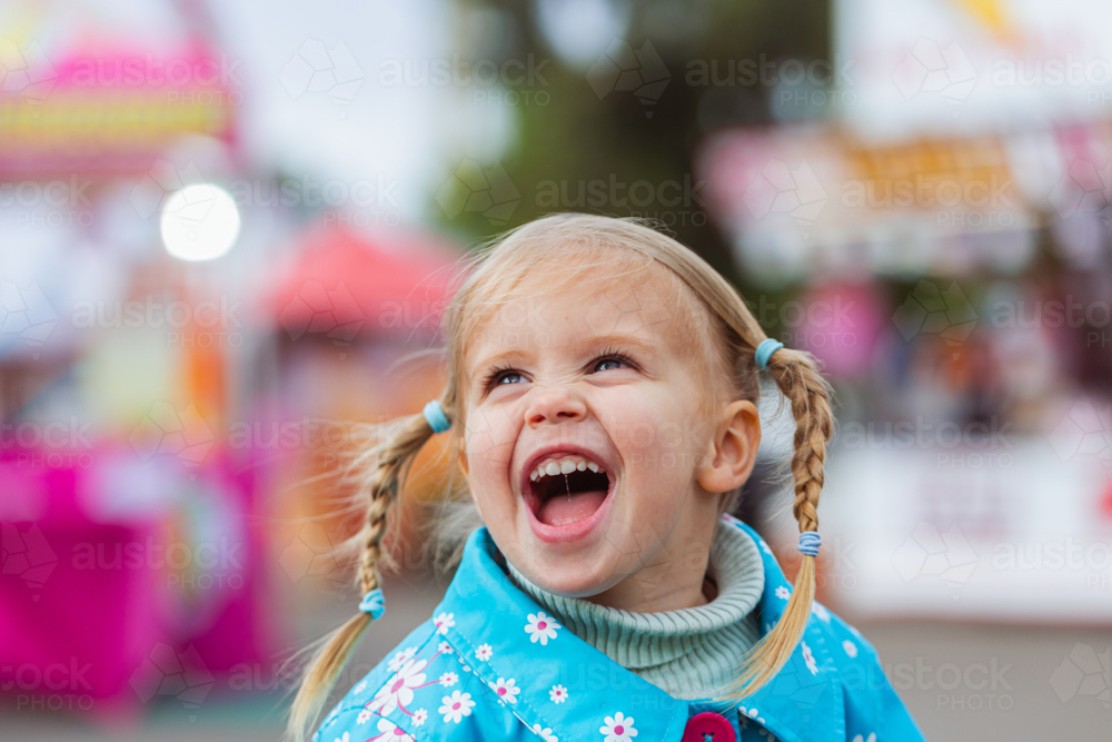 Image of Happy toddler girl portrait at colourful country show event on ...