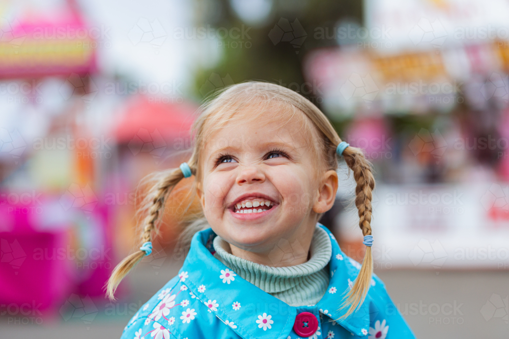 Image of Happy toddler girl portrait at colourful country show event on ...