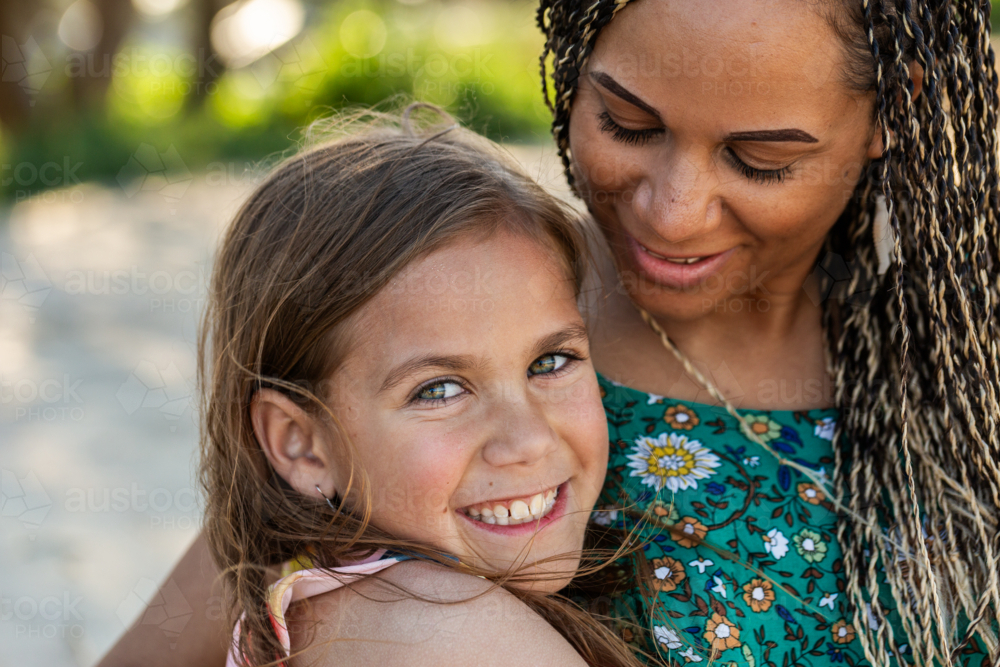 Image of Happy Torres Strait Islander woman with young nine year old ...