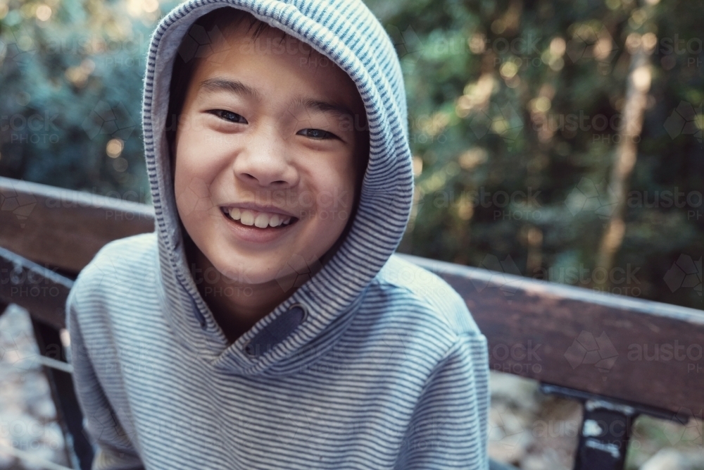 Image of Happy young Asian boy - Austockphoto